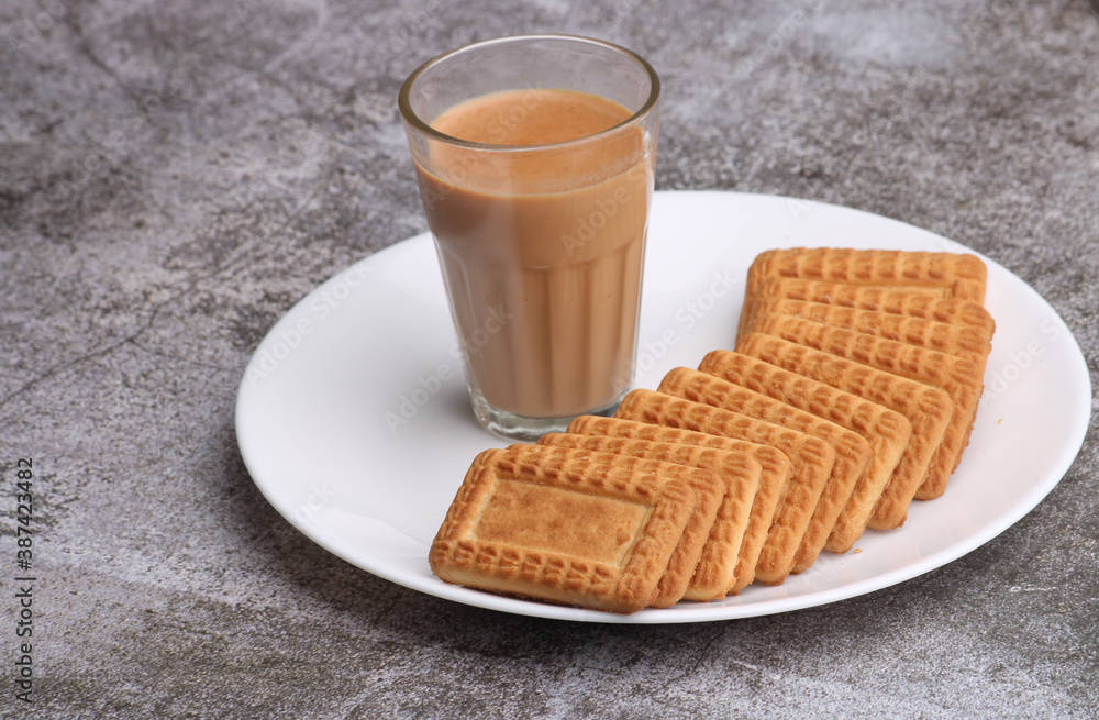Cutting Chai, Traditional Desi Roadside tea of india with biscuits ...