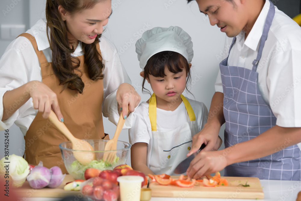 Asian family enjoy with cooking together salad foods homemade in ...