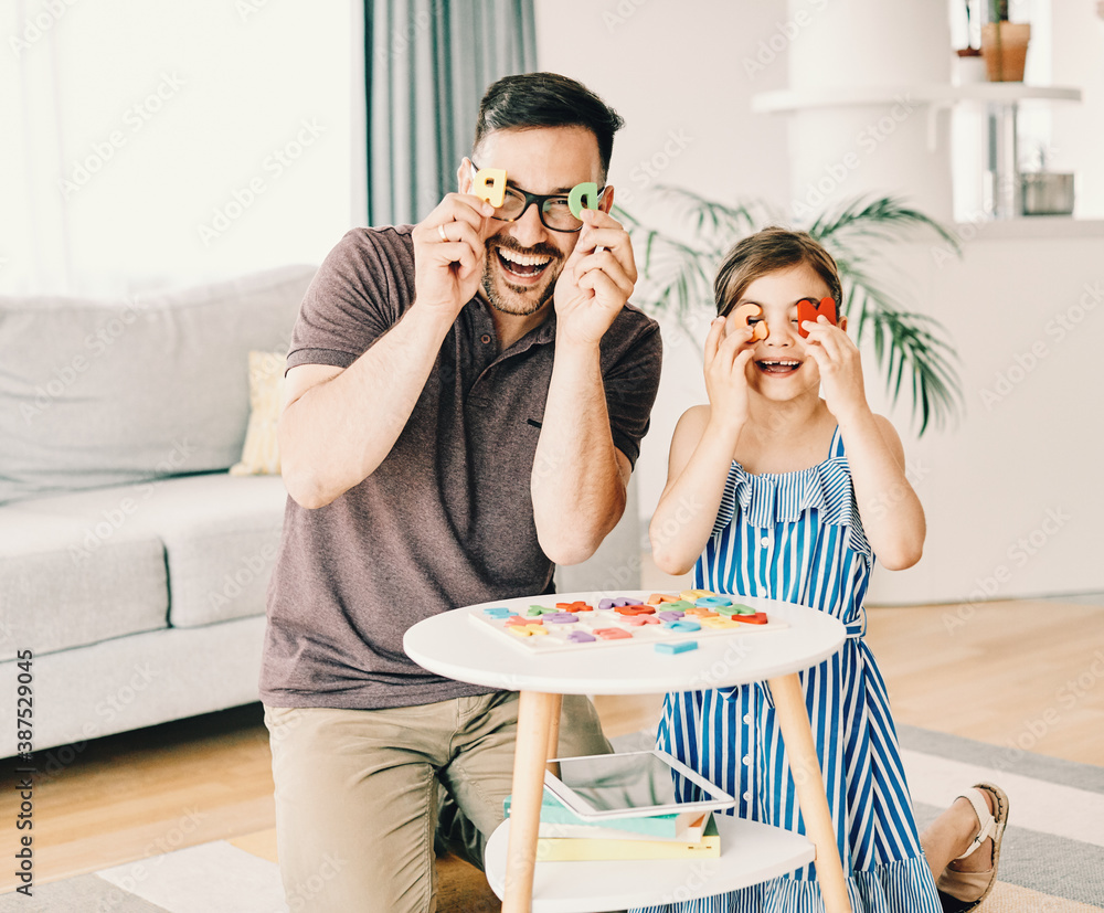 child daughter family happy father board game palying playing fun ...