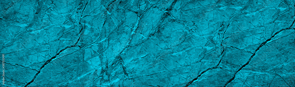 Light blue stone background. Toned turquoise rock texture. A mountain ...