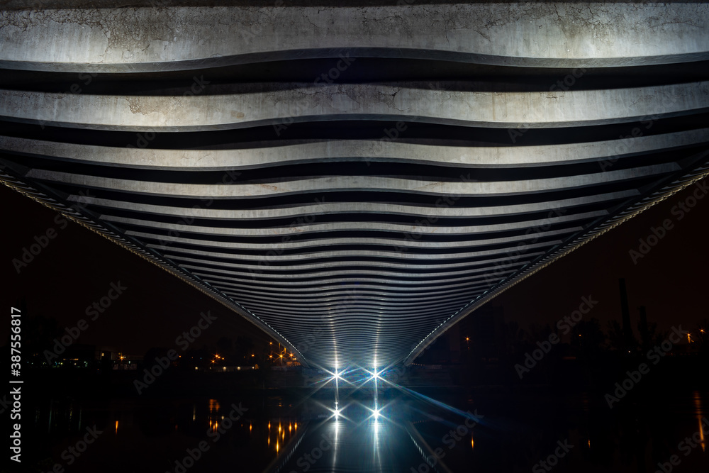 concrete structure and texture of the bridge and shadows from street ...