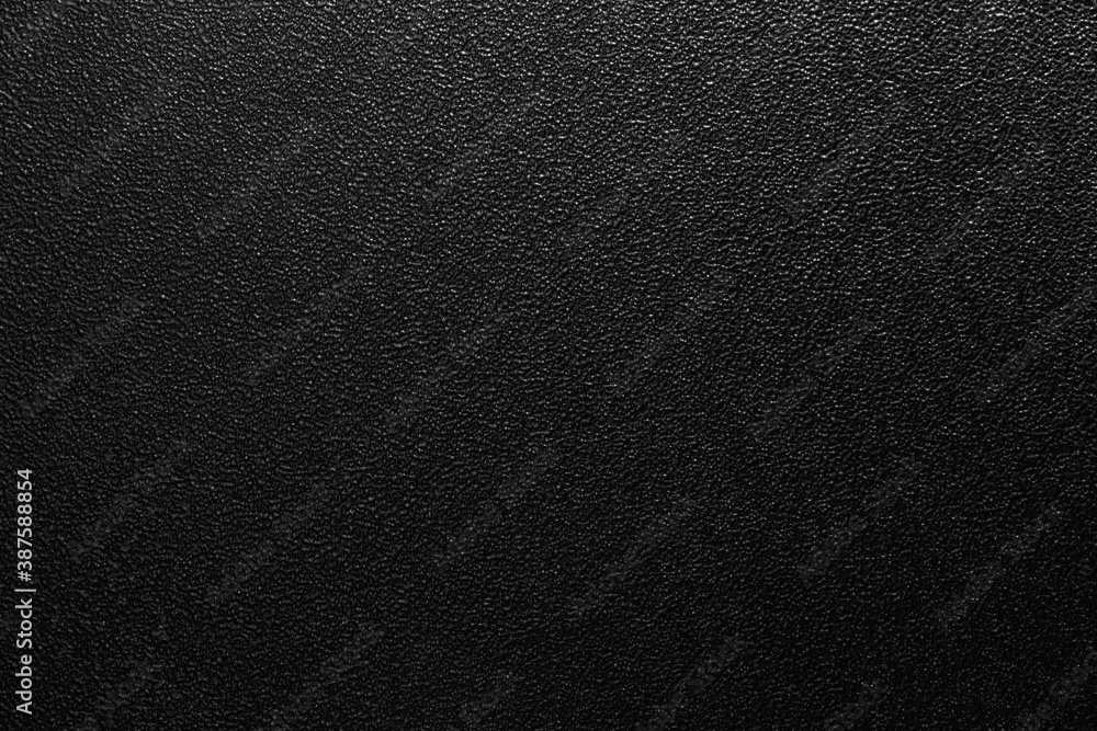 dark background of hammered powder paint coating on flat sheet steel ...