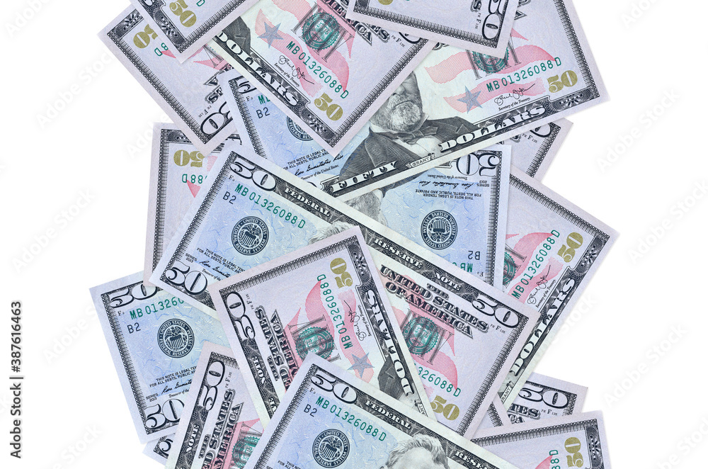 50 US dollars bills flying down isolated on white. Many banknotes ...