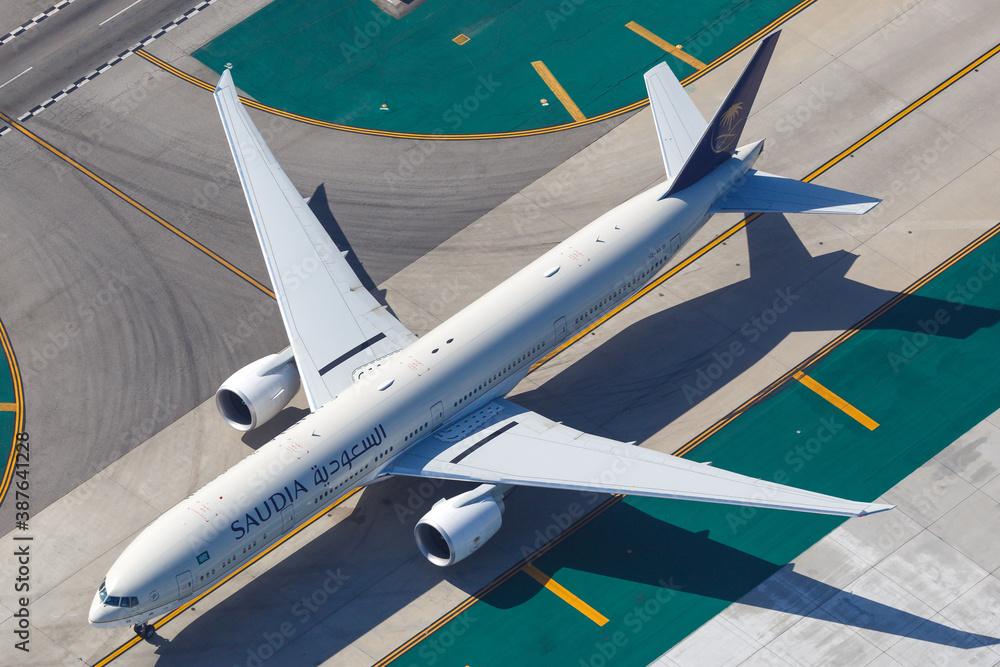 Saudia Boeing 777-300 airplane at Los Angeles airport aerial view Stock ...