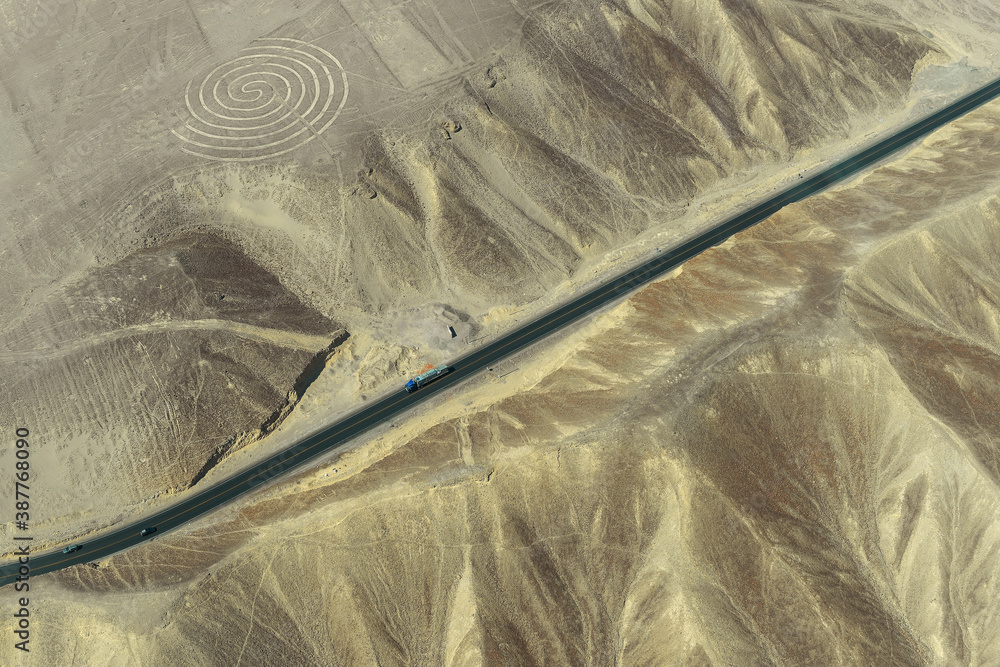 Aerial view of the spiral geoglyph drawing in the peruvian coastal ...