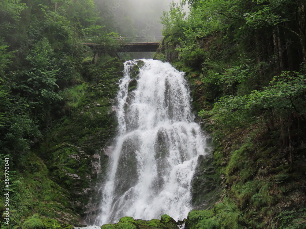 Giessbach Falls in the eponymous nature park and over Lake Brienz ...