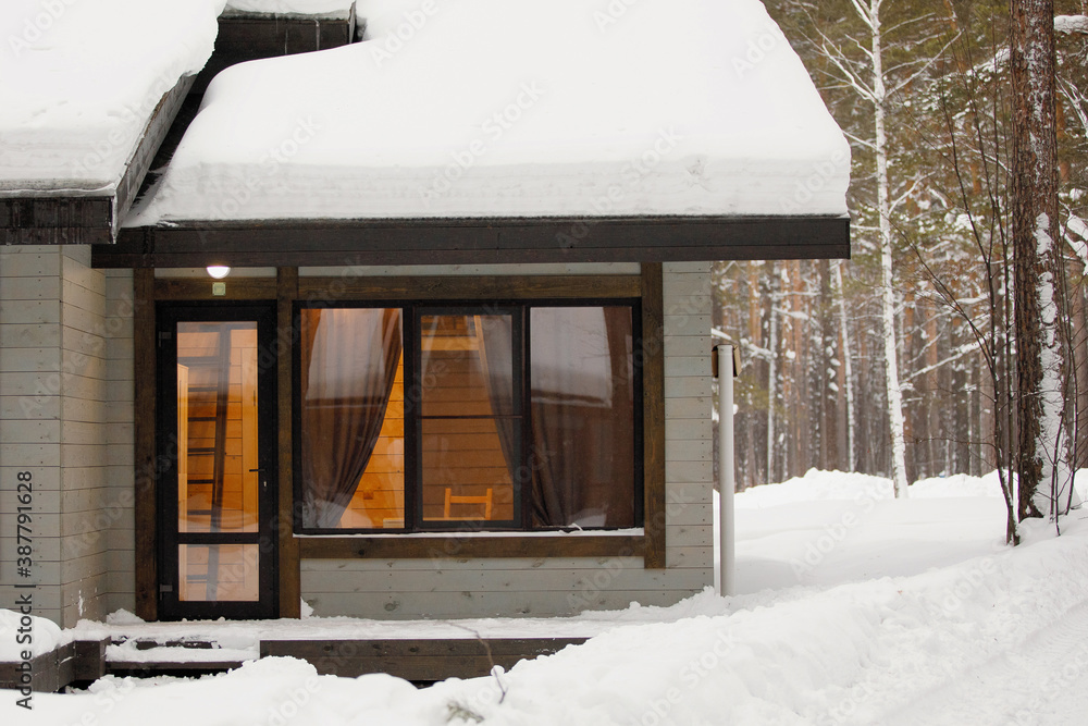 Snow-covered porch of a country house Stock Photo | Adobe Stock