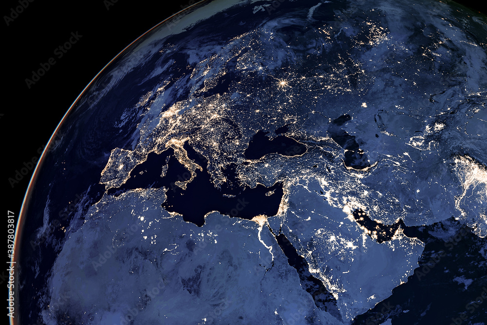 Earth from space at night. View from satellite orbit to the lights of ...