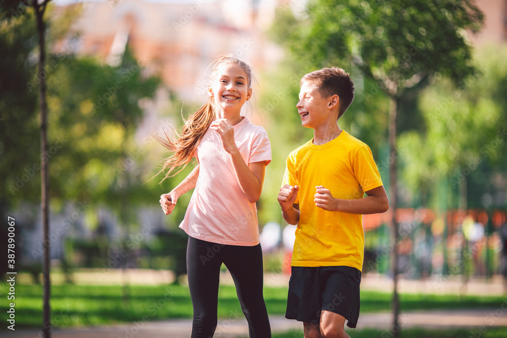Kids run. Healthy sport. Child sport, heterosexual twins running on ...