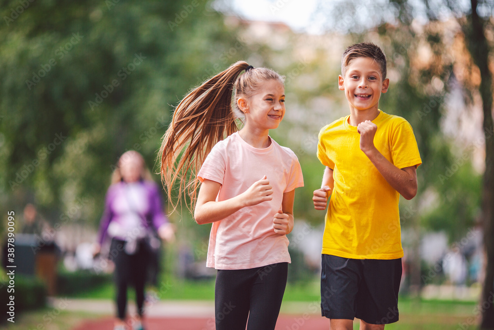 Kids run. Healthy sport. Child sport, heterosexual twins running on ...