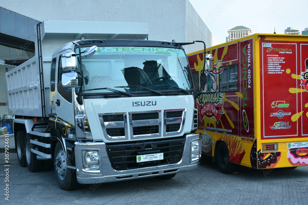 Isuzu dump truck in Pasig, Philippines Stock Photo | Adobe Stock