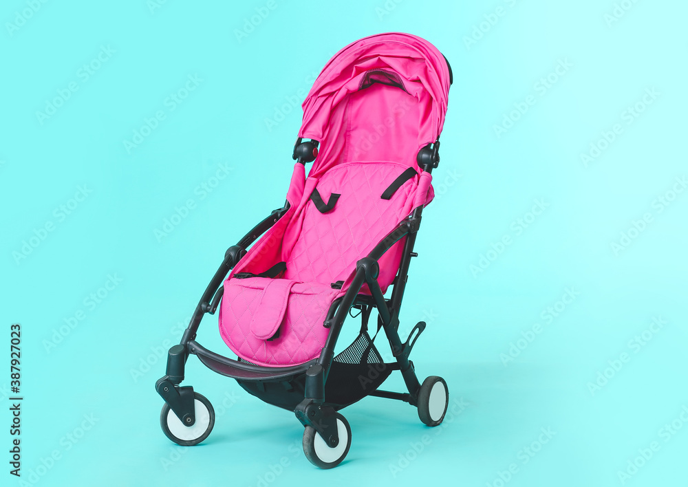 Modern baby stroller on color background Stock Photo | Adobe Stock