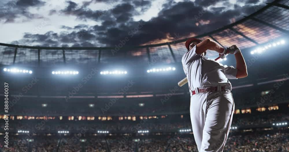Baseball player in action on the professional stadium. The stadium is ...