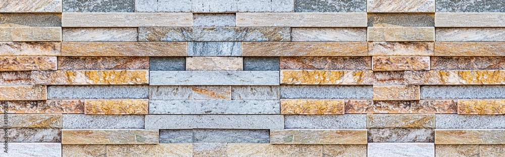 Panorama of Block pattern brown stone cladding wall tile texture and ...