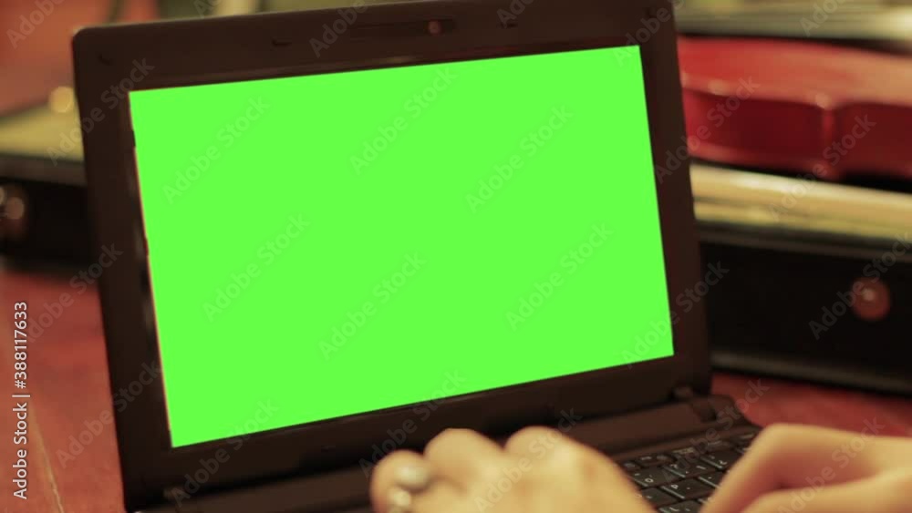 Black Laptop with Green Screen. Close Up. You can replace green screen ...