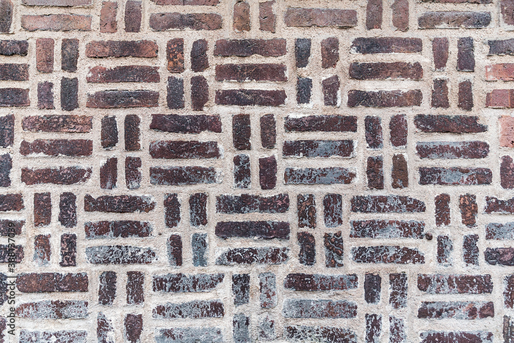 Ground texture with brickwork. Beautiful old pavement with a pattern of ...