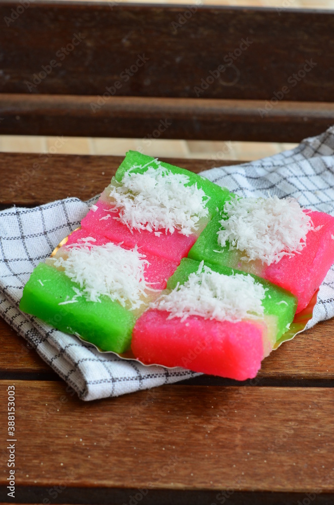 Gethuk lindri or food from Cassava and coconut at the wood table ...