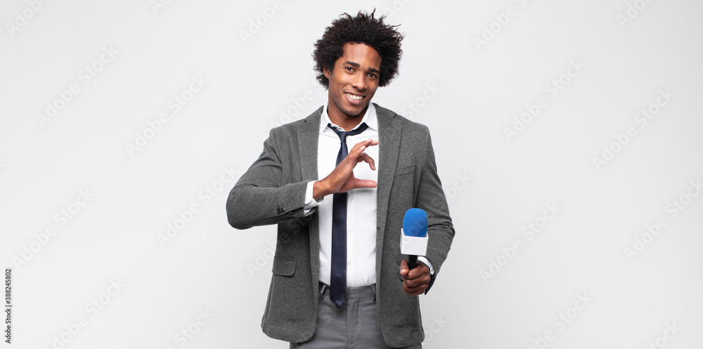 young black man as a tv presenter Stock Photo | Adobe Stock