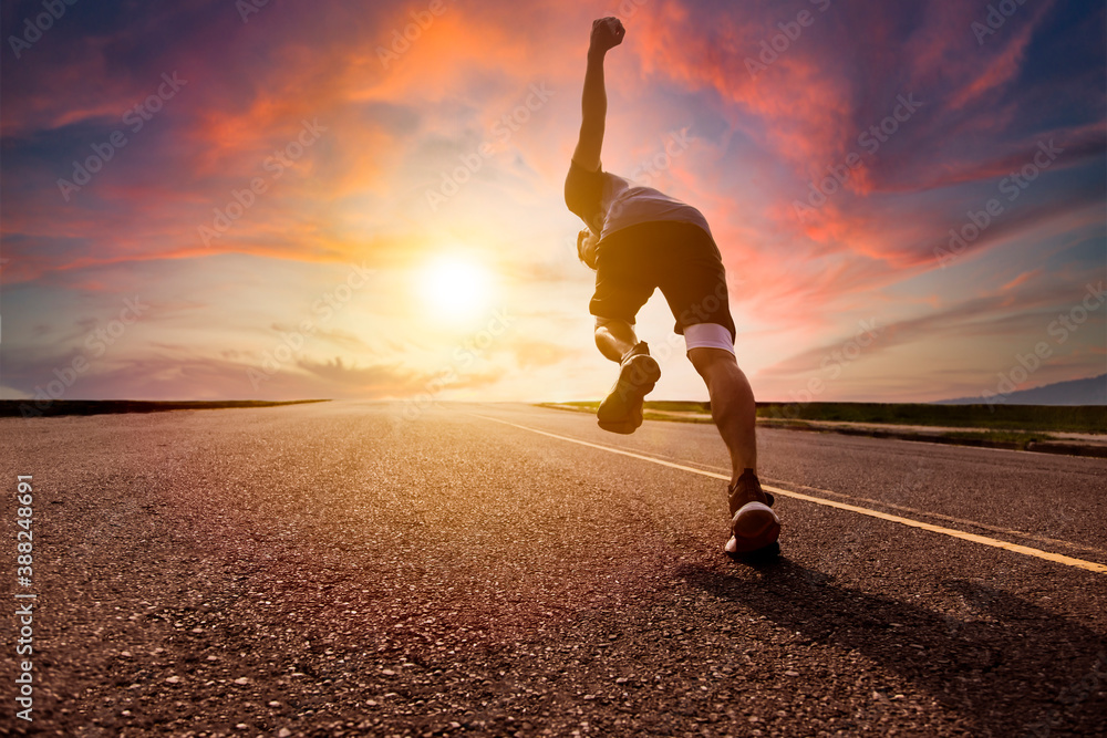 man running and sprinting on road with sunset background Stock Photo ...