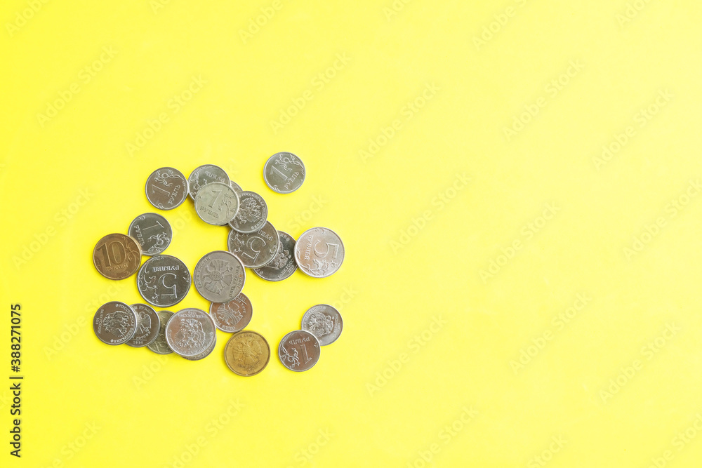 On a yellow background money, coins. Economy concept, money ...
