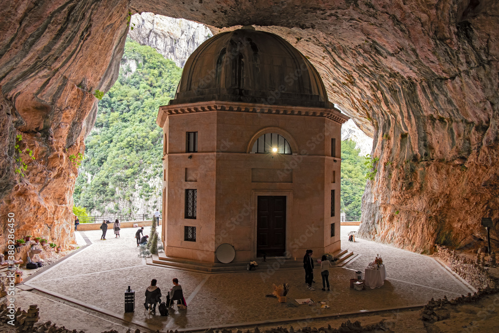 Top view of the Sanctuary of the Madonna di Frasassi, immersed in a ...