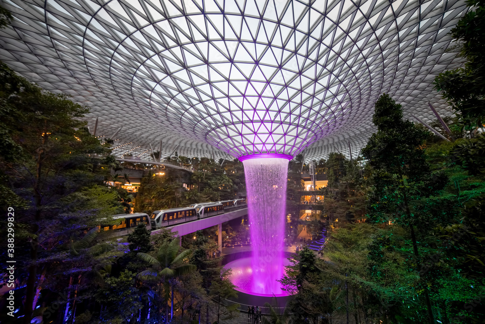 SINGAPORE - MARCH 3, 2020: Waterfall at the shopping center JEWEL at ...