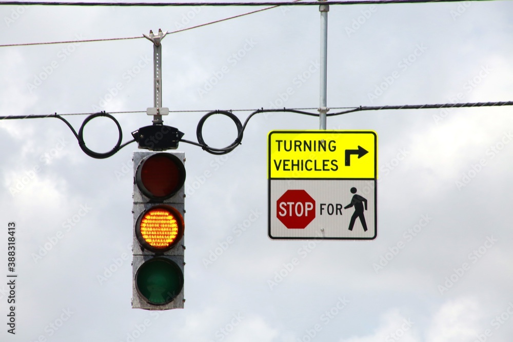 Yellow Traffic Light next to Turning Vehicles arrow right Stop for ...