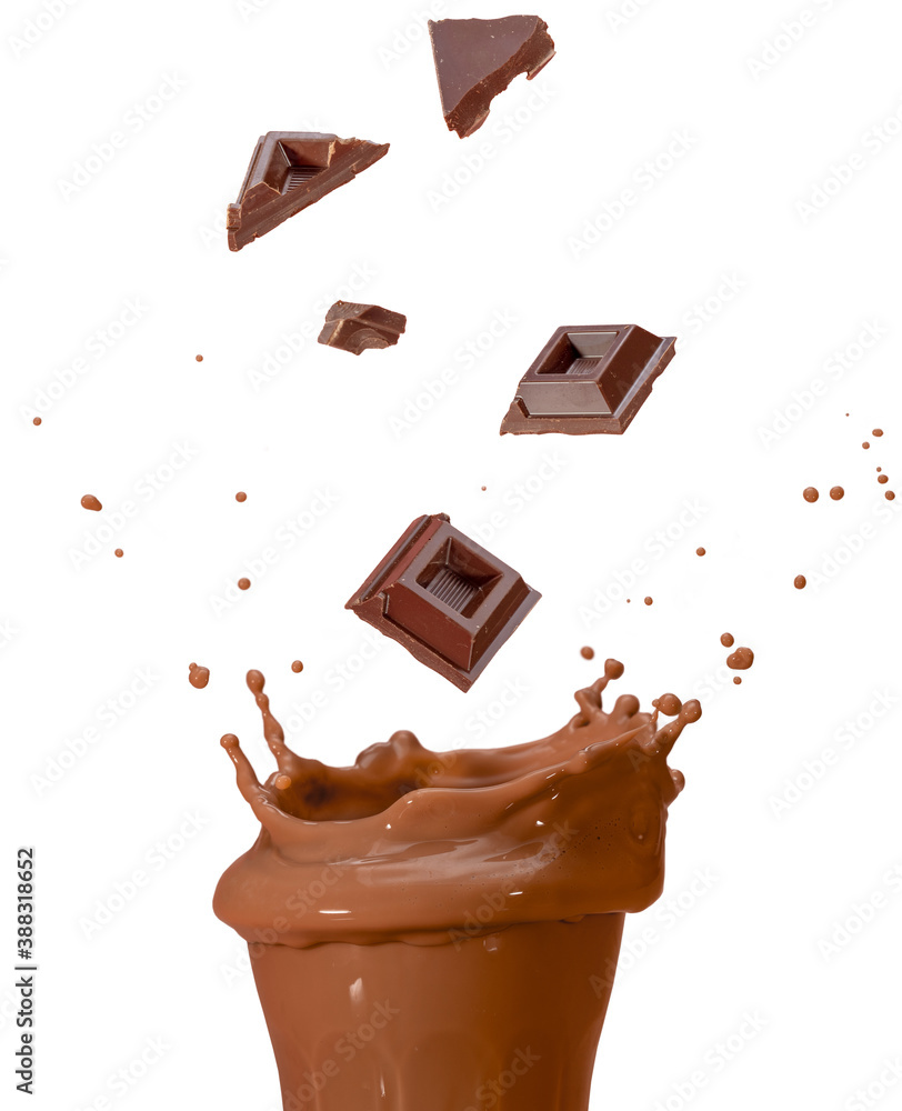 chocolate cubes falling into a splashing choco milkshake isolated on ...