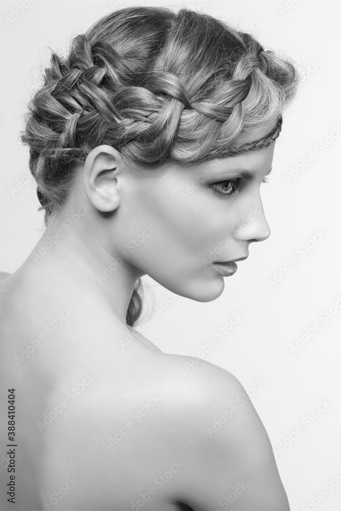 Black and white portrait in high key tone female with creative hairdo ...