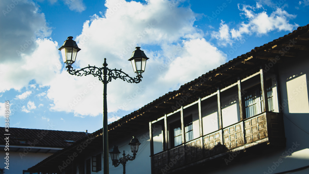 Old spanish architecture in cusco with a lamp post during sunset Stock ...
