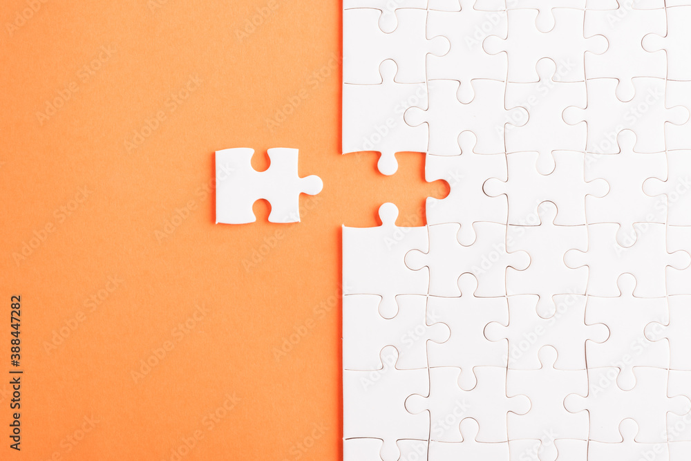 Top view flat lay of paper plain white jigsaw puzzle game texture last ...