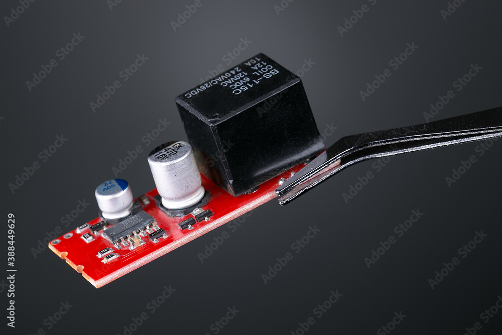 electronic board with various radio components and devices in operation ...