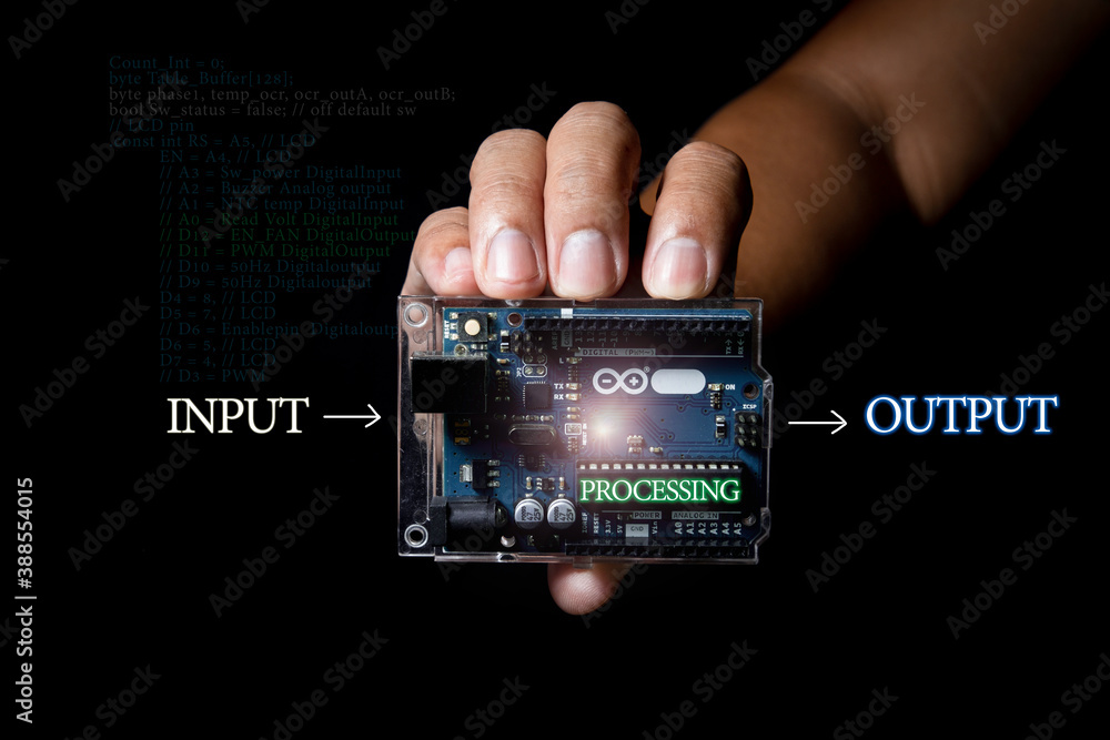 Arduino controller board element photo in dark background with ...