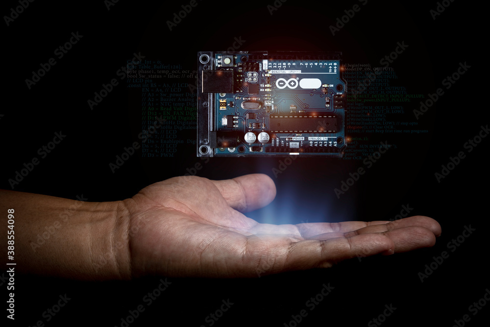 Arduino controller board element photo in dark background with ...