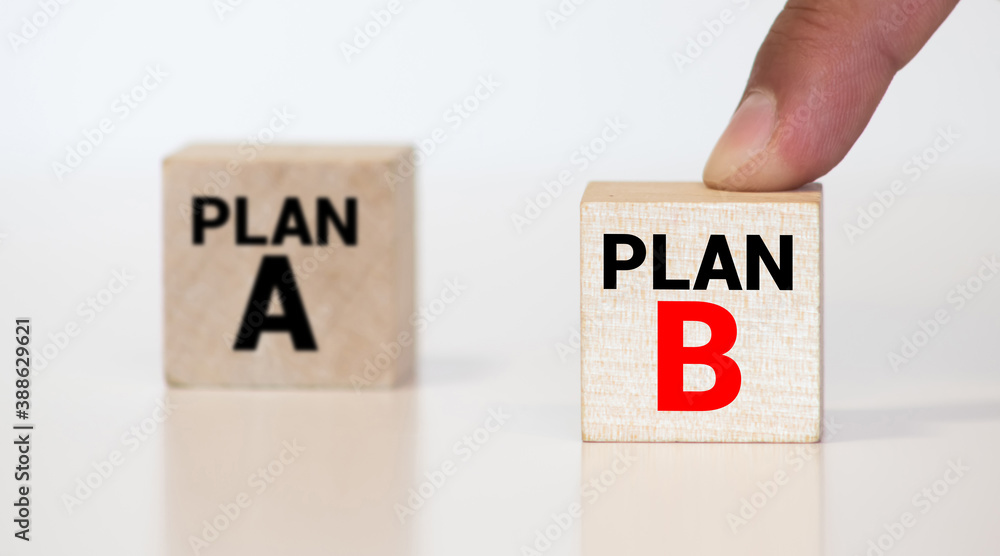 Time for Plan B. Hand is turning a dice and changes the word Plan A to ...