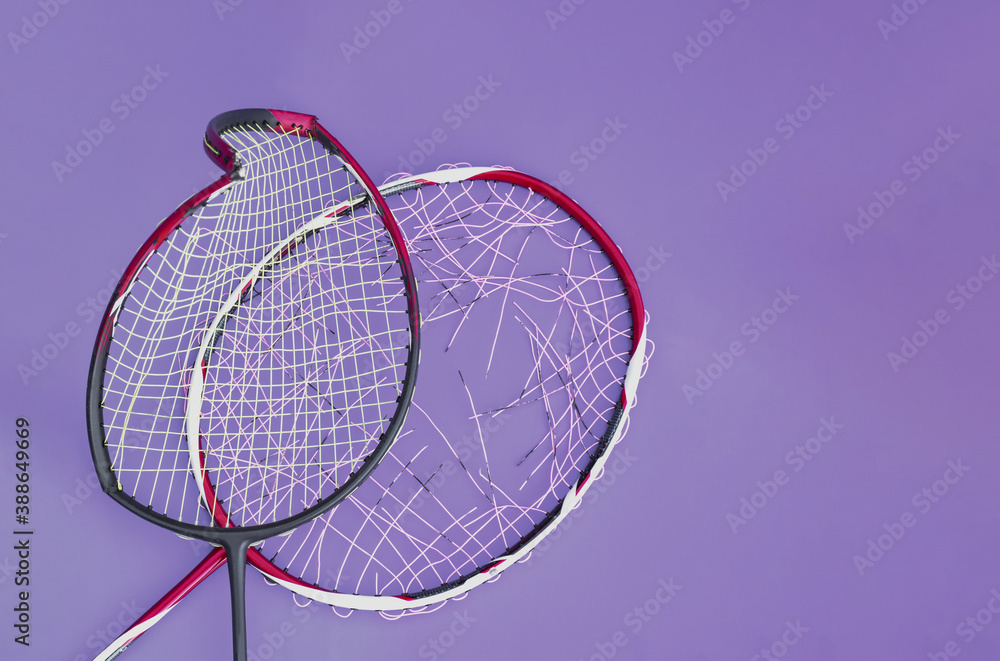 Broken badminton rackets and used badminton shuttlecocks feather balls ...