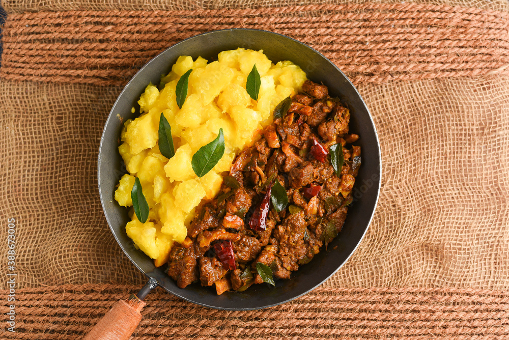 Cooked tapioca and spicy meat curry , Cassava root , Mandioca or Aipim ...