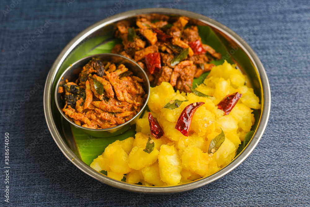 Cooked tapioca with spicy fish curry , Cassava root , Mandioca , Aipim ...