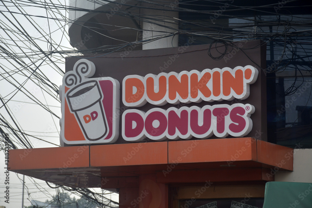 Dunkin donuts signage in Mandaluyong, Philippines Stock Photo | Adobe Stock