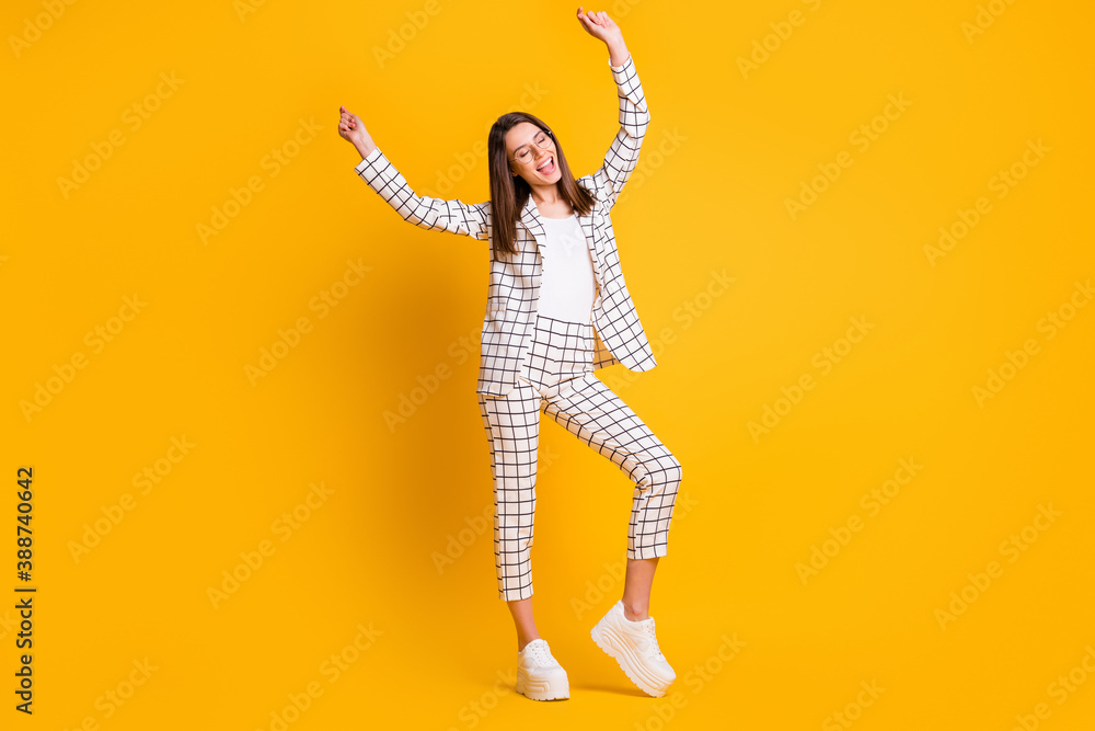 Full length body size photo of dancing girl wearing checkered suit ...