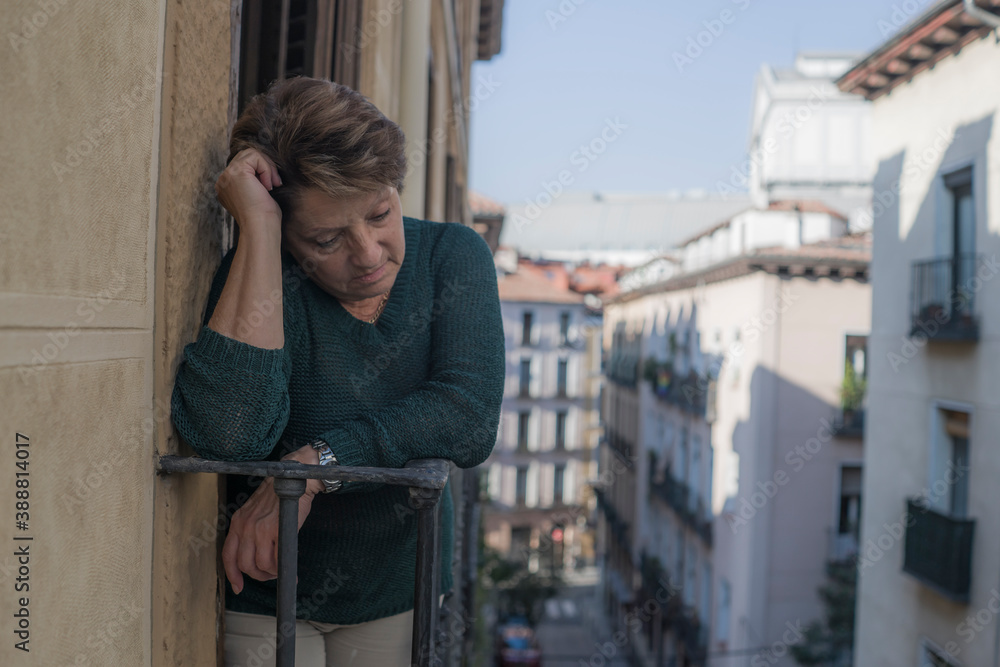 dramatic lifestyle portrait of mature woman on her 70s crying depressed ...