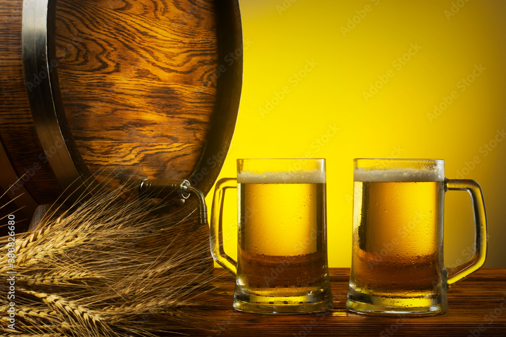 Two glasses of light beer, an oak barrel and a sheaf of barley. Free ...