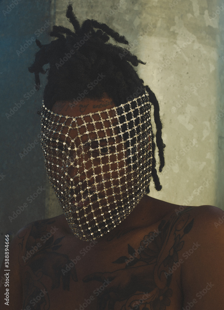 Portrait Of Black Man Wearing Full Face Mask Stock Photo | Adobe Stock
