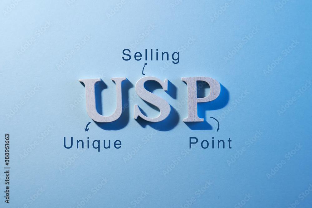 close up of aphabet usp on blue background -word unique selling point ...