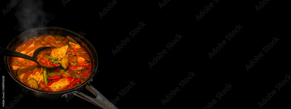 Banner with traditional homemade spicy turkey stew with vegetables and ...