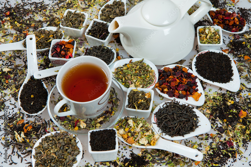 Assortment of dry tea. Various kinds of tea isolated on white.Different kinds of tea leaves. Tea ...