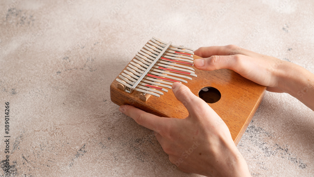 Kalimba 17 key notes thumb piano. Kalimba or mbira is a wooden resonant ...