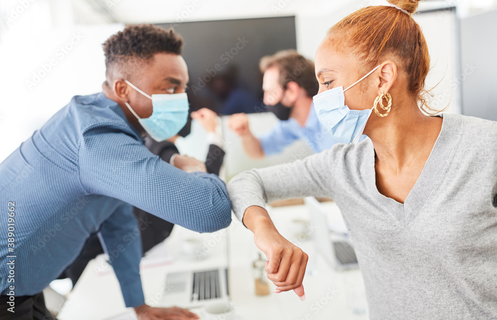 Business people greet each other with elbows over Covid-19 Stock Photo ...