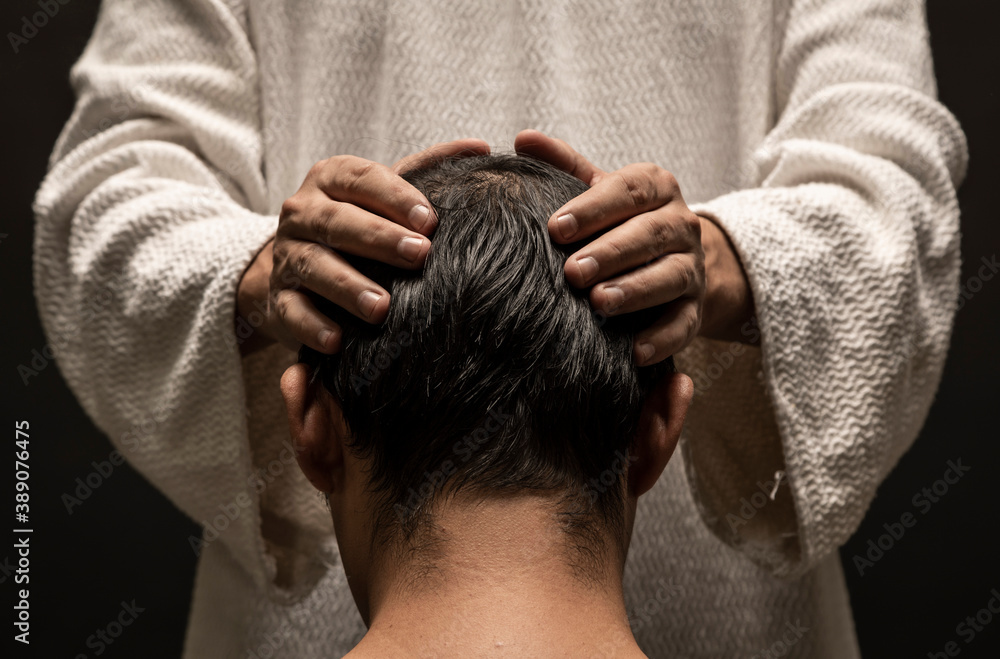 Jesus Christ giving absolution of their sins during a dark night. Stock ...