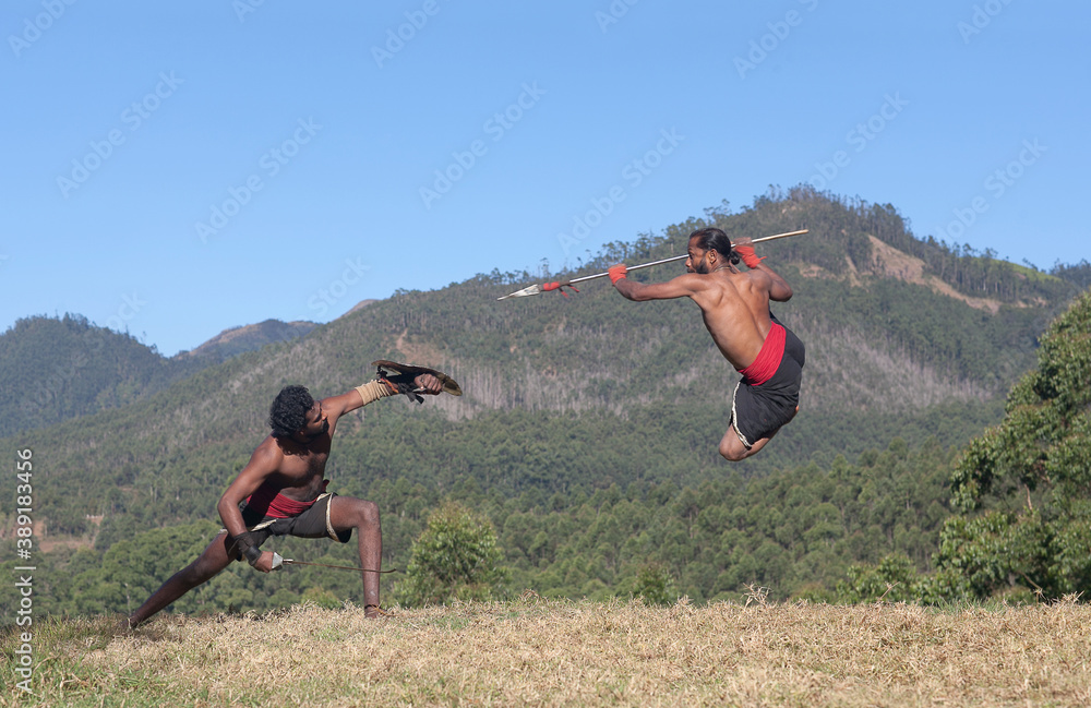 Indian fighters performing Aayudha Payattu (Weapon Combat) during ...